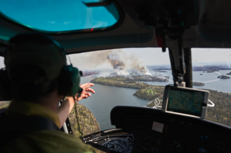 Manitoba premier tours fire zone as evacuees await word on their future